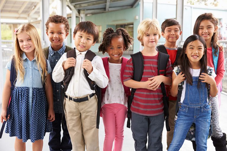 Group Portrait Of Elementary School Kids In School Corridor - Wisconsin ...